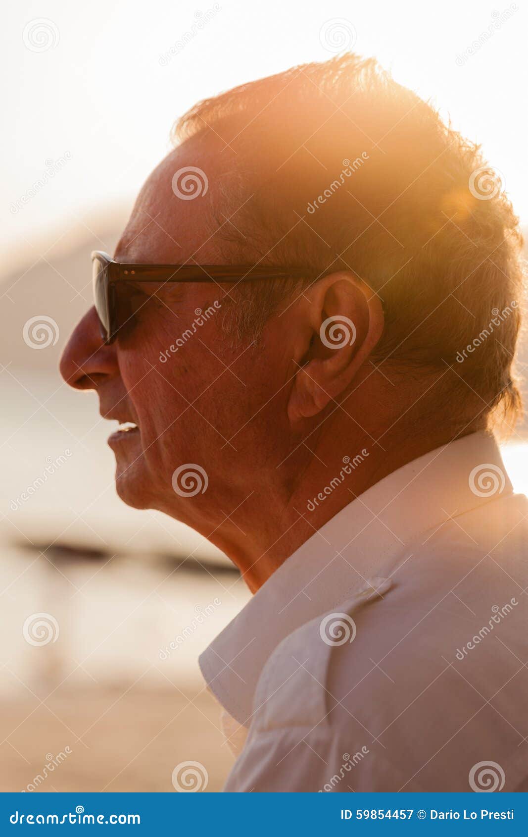 Old man in the sunset stock image. Image of lonely, relaxation - 59854457
