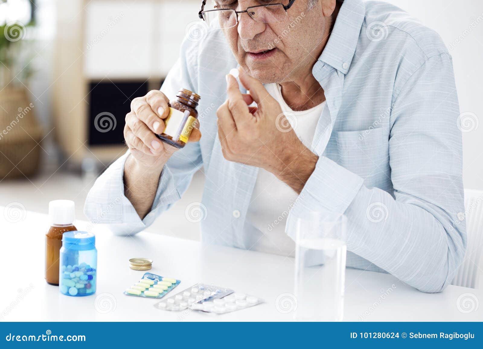 Old man taking pills stock photo. Image of fever, bottle - 101280624
