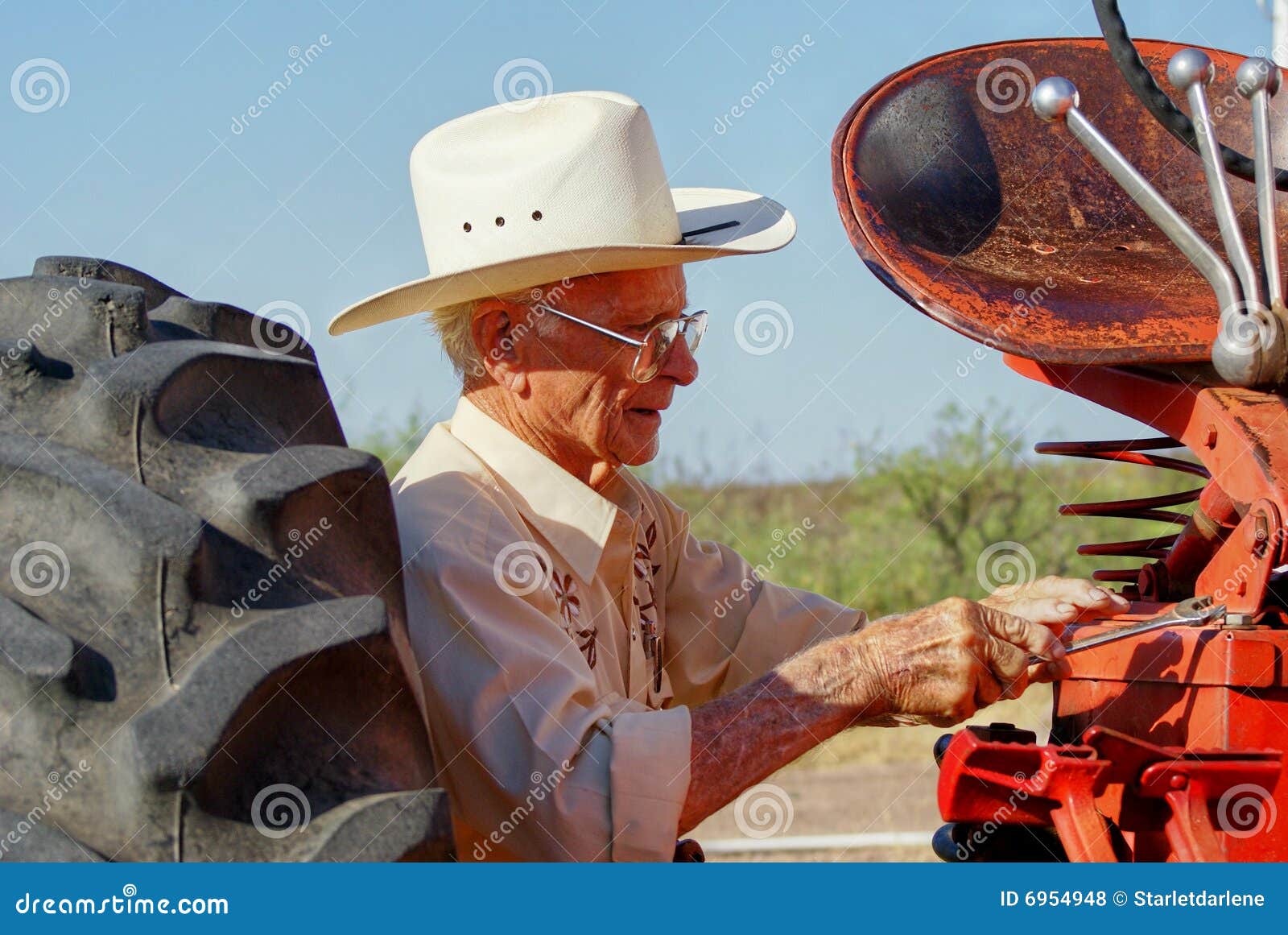 Old man with tractor stock photo. Image of rancher, agriculture - 6954948