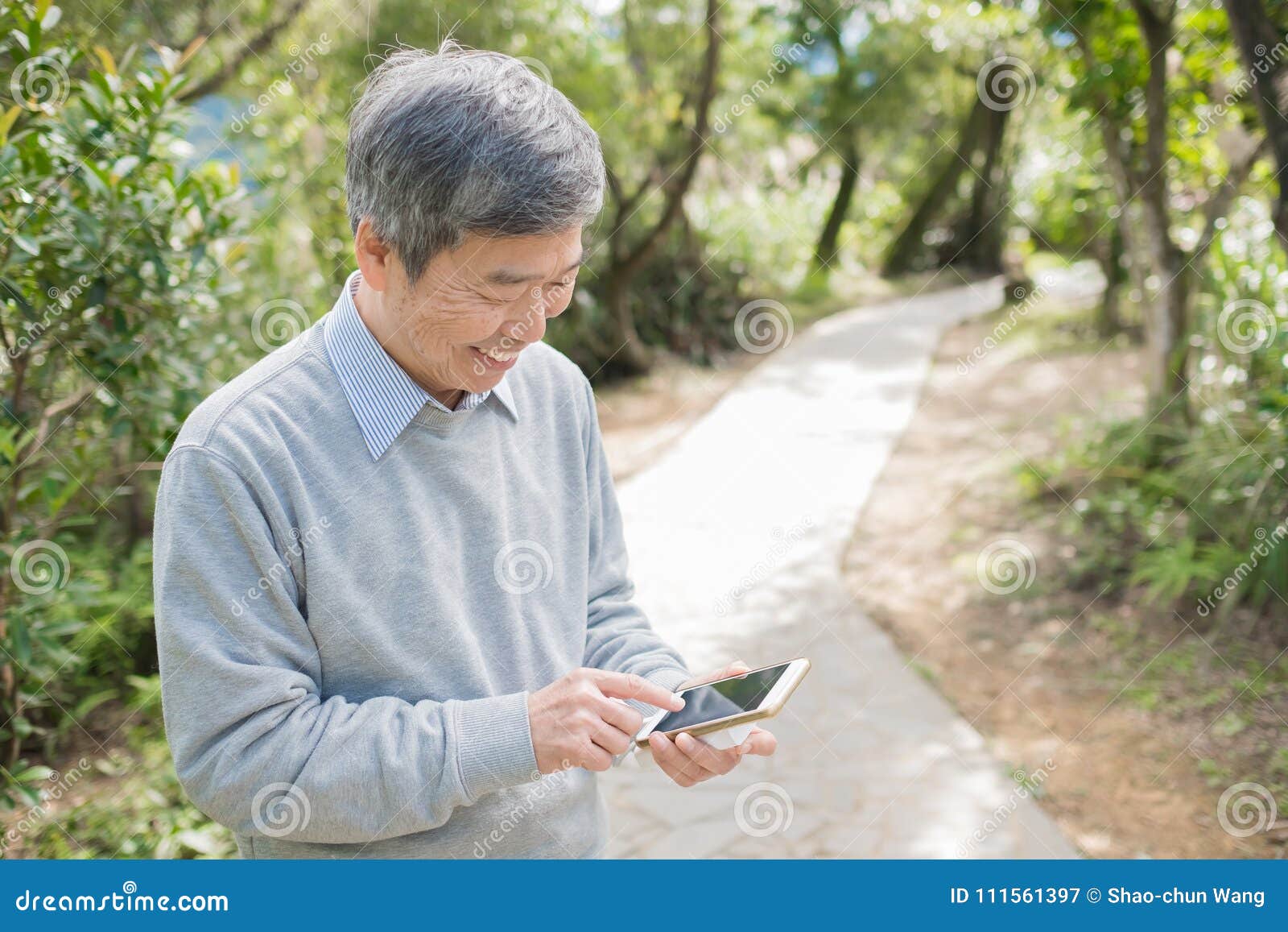 Old man use phone stock image. Image of asian, older - 111561397