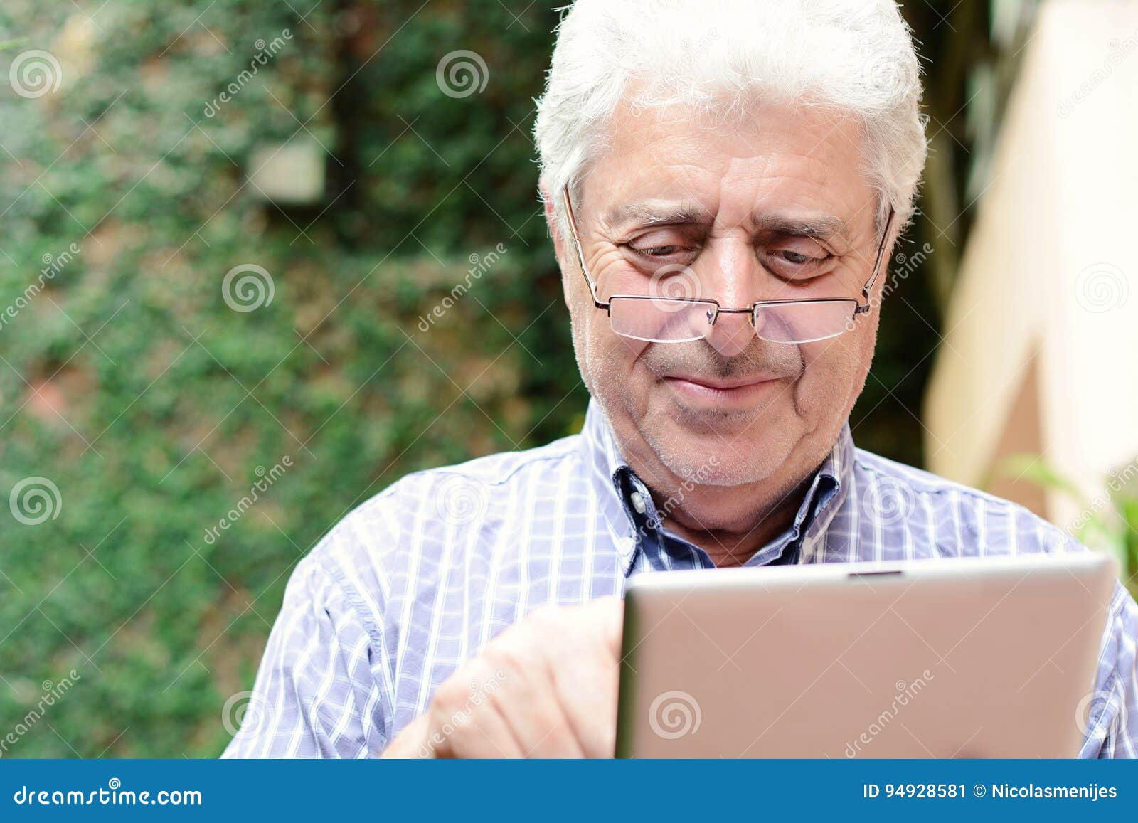 Old Man Using Digital Tablet. Stock Image - Image of portable, looking ...