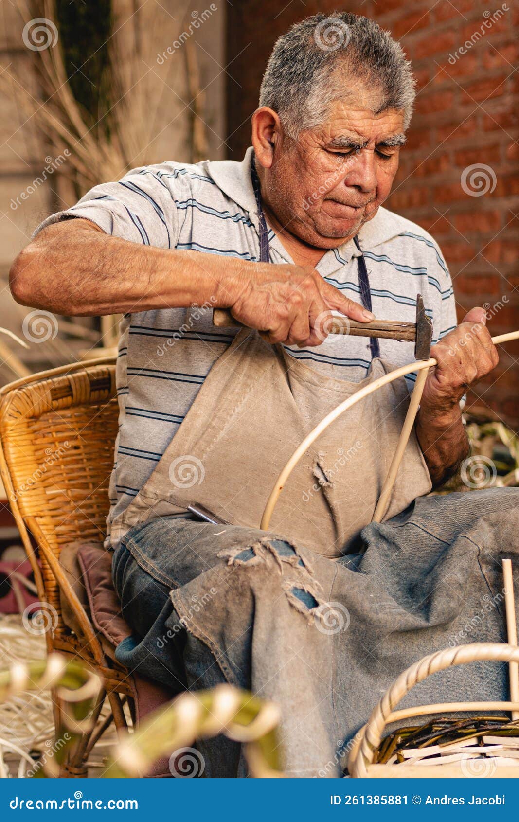 Old Man Using Hammer for Making Wicker Baskets at His Workshop Stock ...