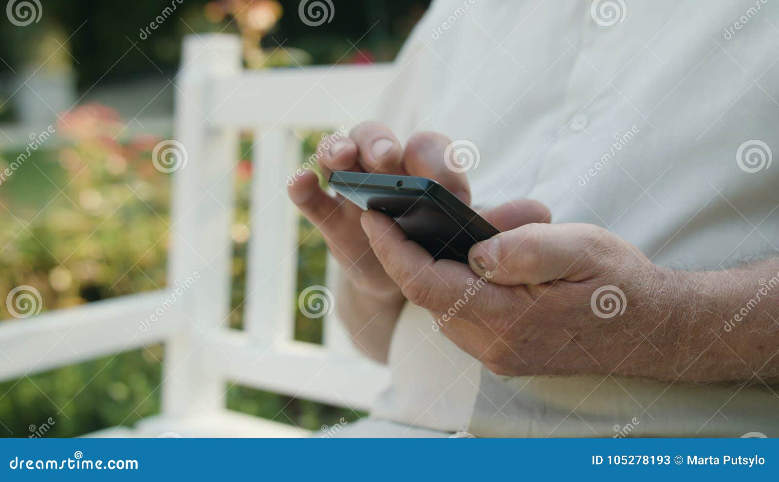 Old Man Using a Phone Outdoors Stock Image - Image of glasses ...