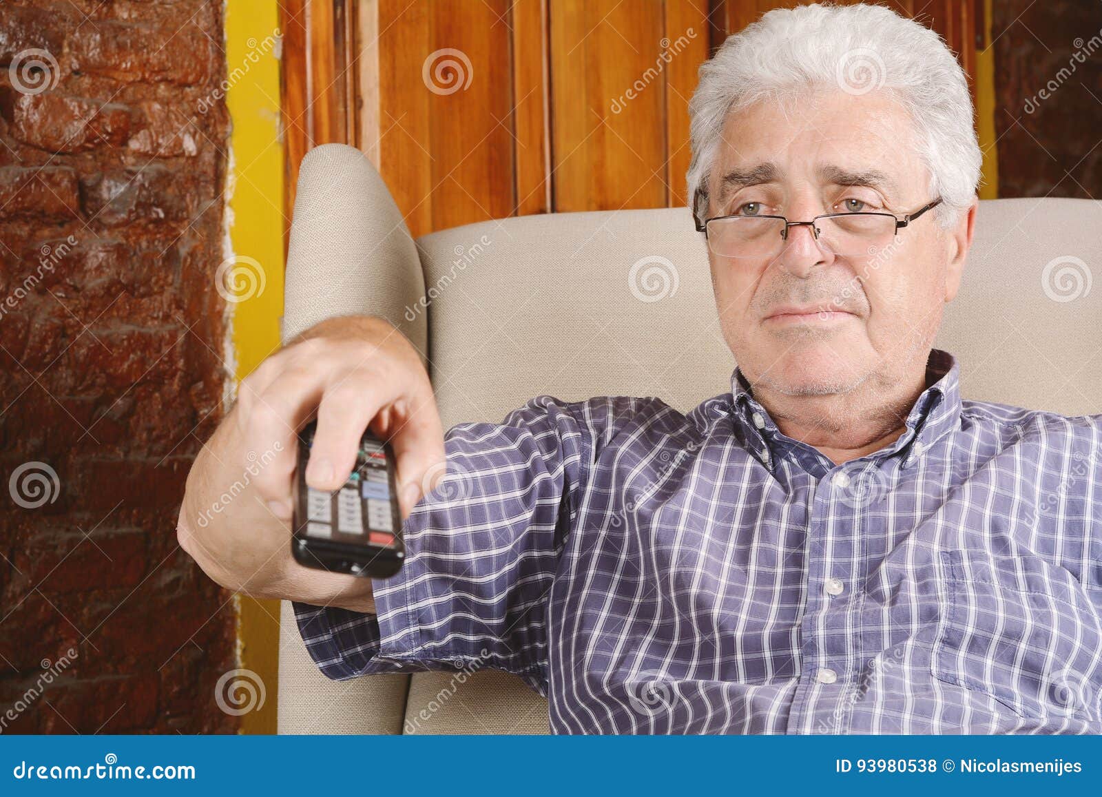 Old Man Using Remote Control. Stock Photo - Image of changing, adult ...