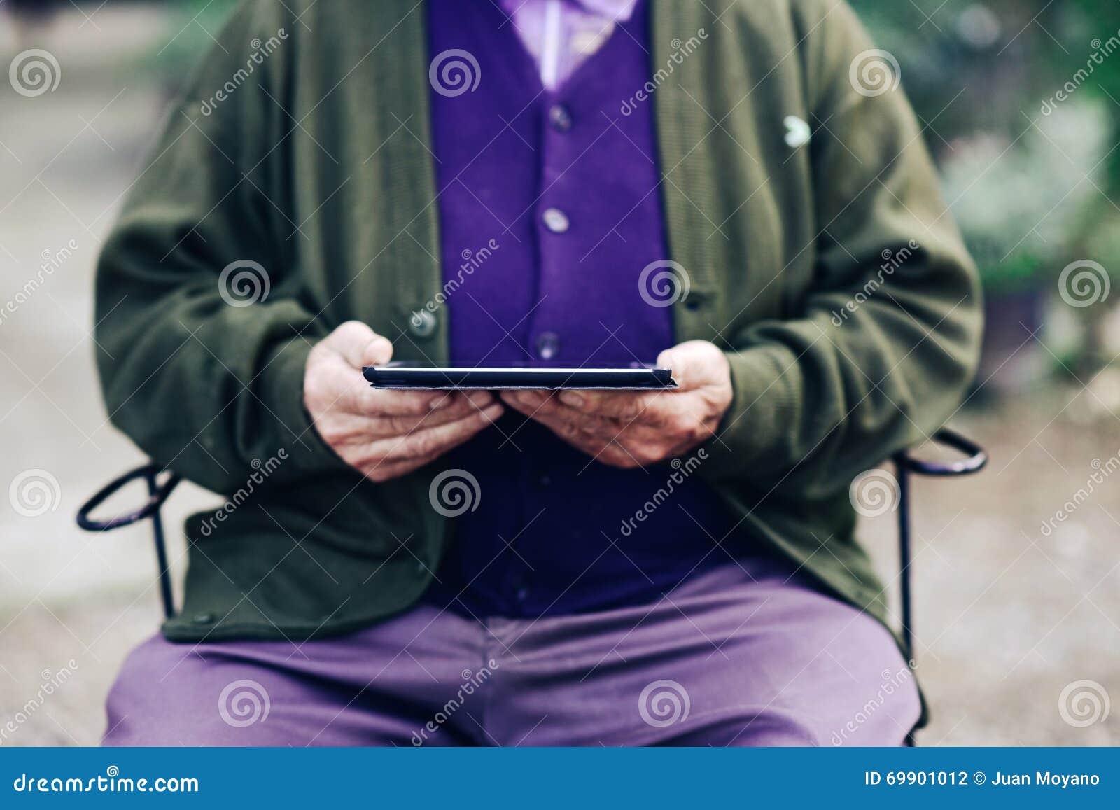 Old Man Using a Tablet Computer Outdoors Stock Photo - Image of ...