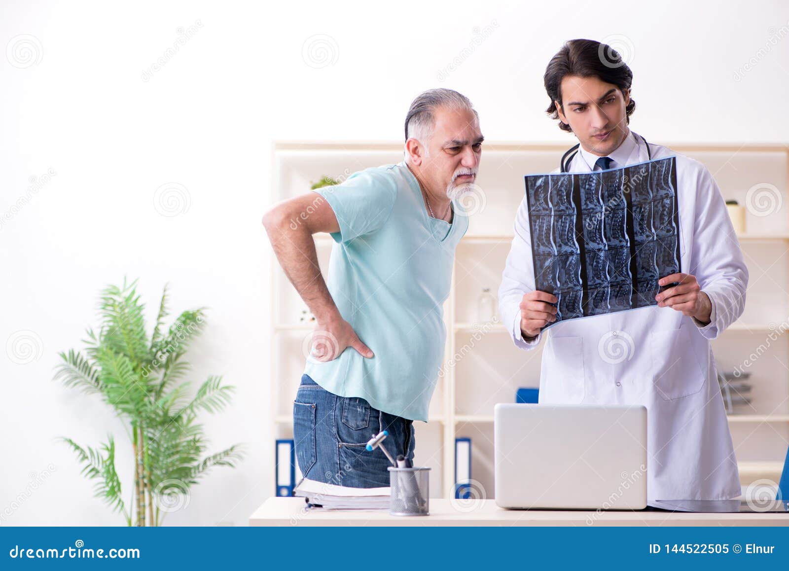 The Old Man Visiting Young Male Doctor Stock Image - Image of imaging ...