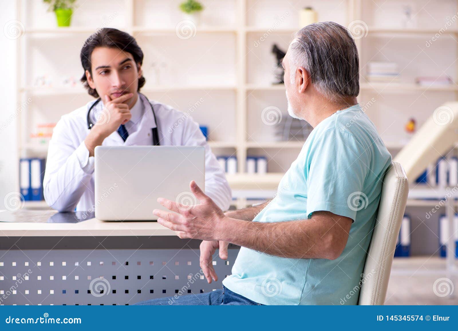 The Old Man Visiting Young Male Doctor Stock Photo - Image of clinical ...