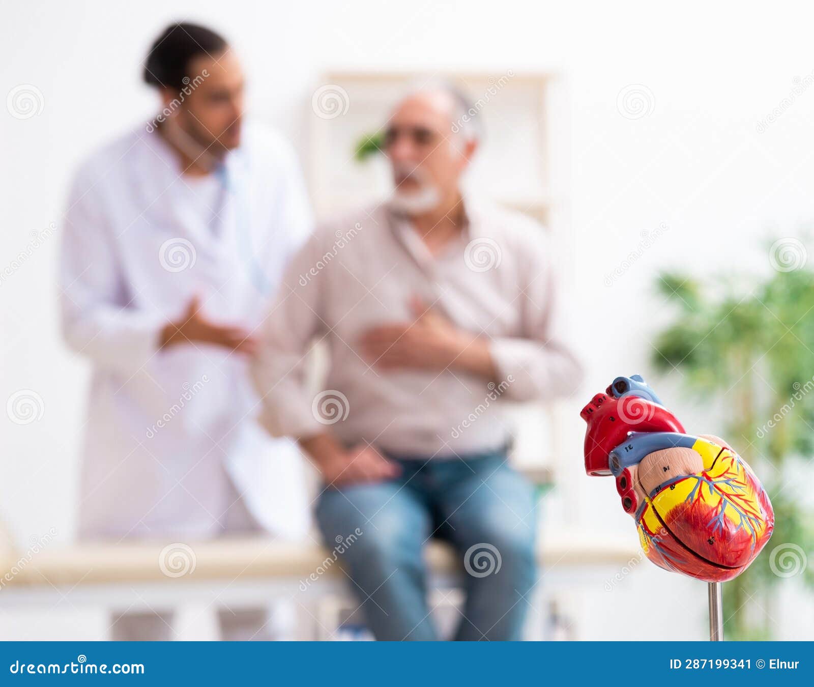 Old Man Visiting Young Male Doctor Cardiologist Stock Image - Image of ...