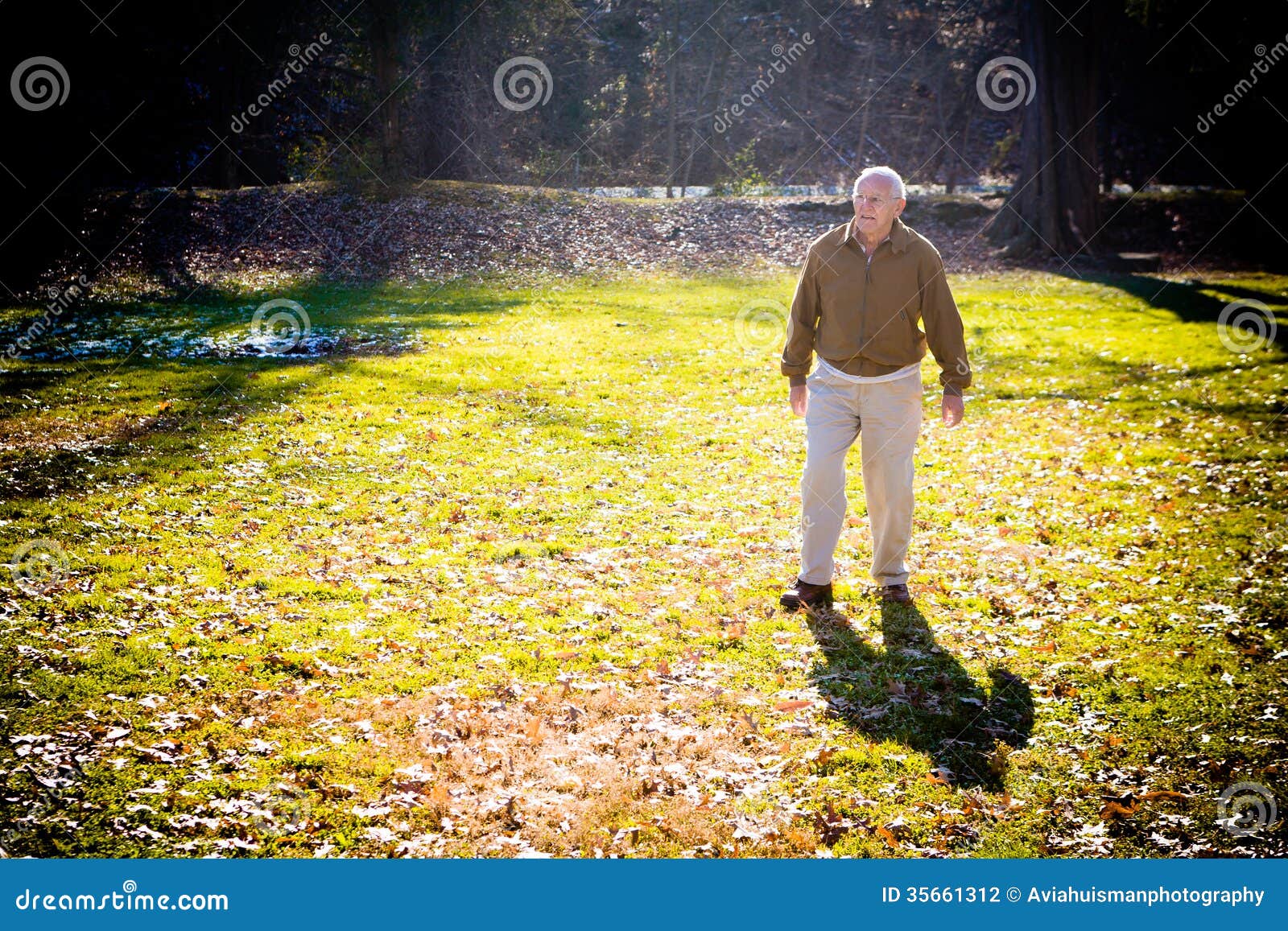 Old Man Walking Outside in the Fall Stock Photo - Image of blue ...