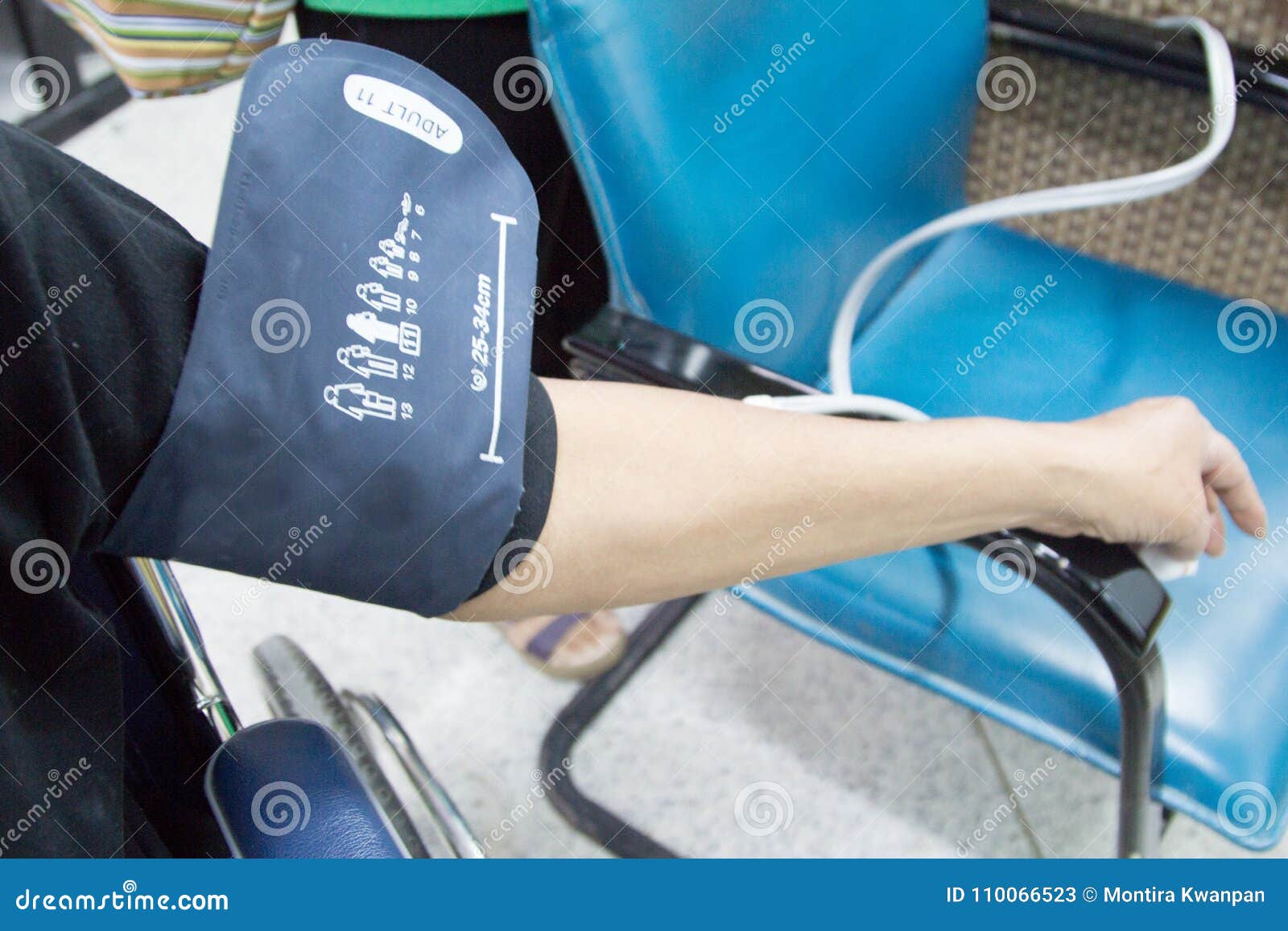 The Old Man Was Checkup by Automatic Sphygmomanometer. Stock Image ...