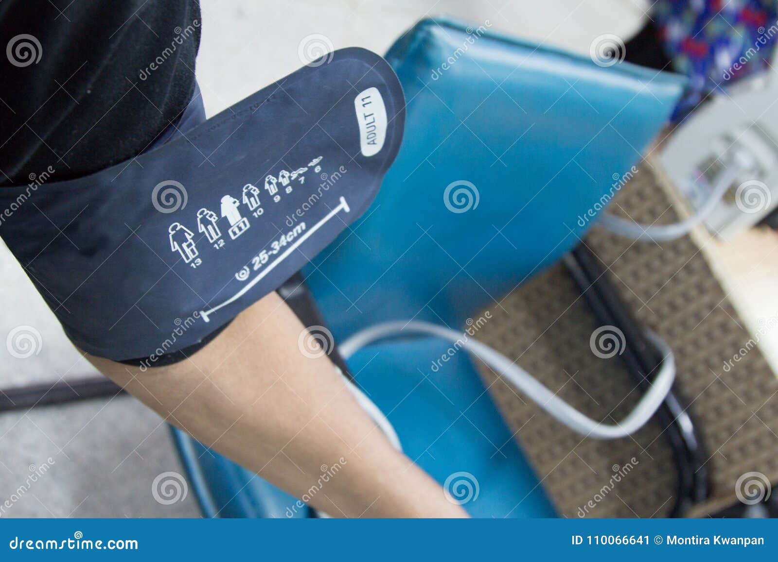 The Old Man Was Checkup by Automatic Sphygmomanometer. Stock Image ...