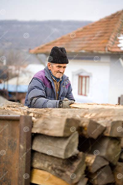 Old man at work stock photo. Image of farmer, heat, logs - 8277458