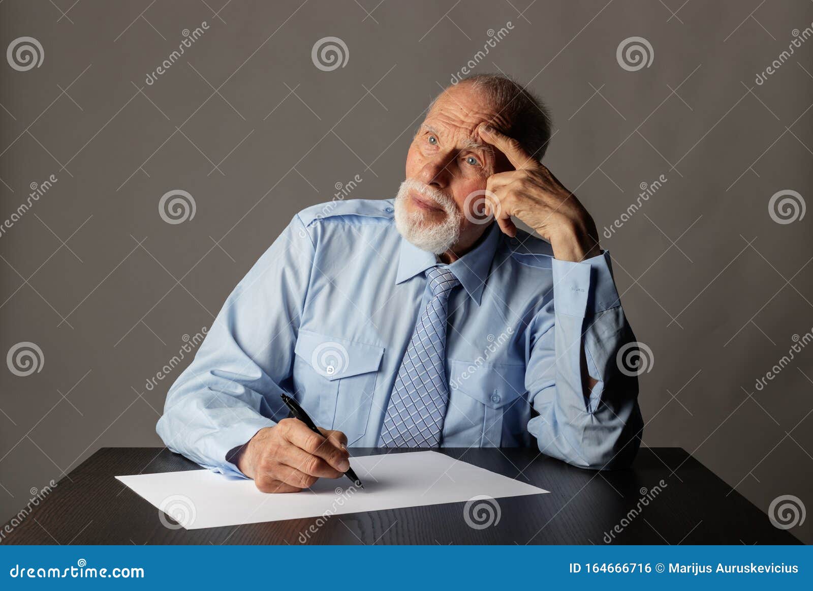 Old man is writing stock photo. Image of people, male - 164666716