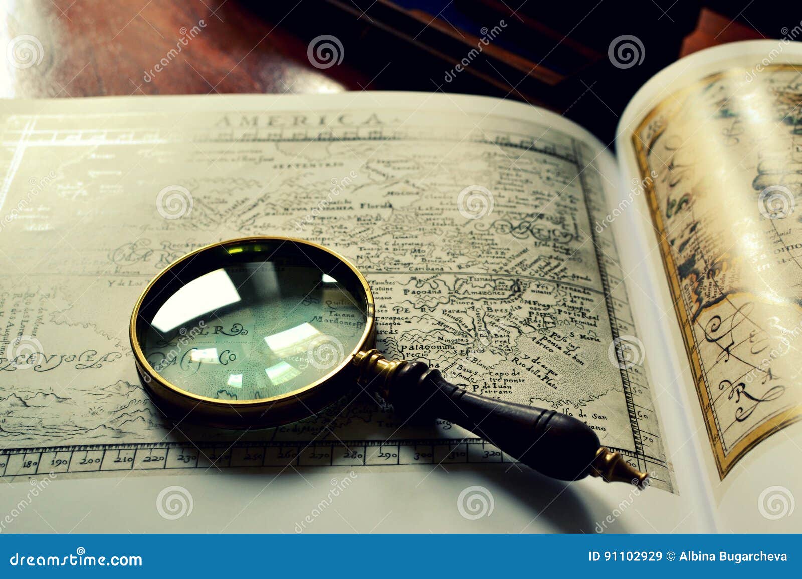 Old maps and a magnifier stock image. Image of antique - 91102929