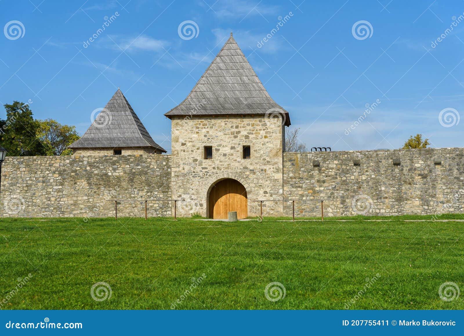Old Medieval Castle Wall with Tower and Big Grass Field Stock Image ...