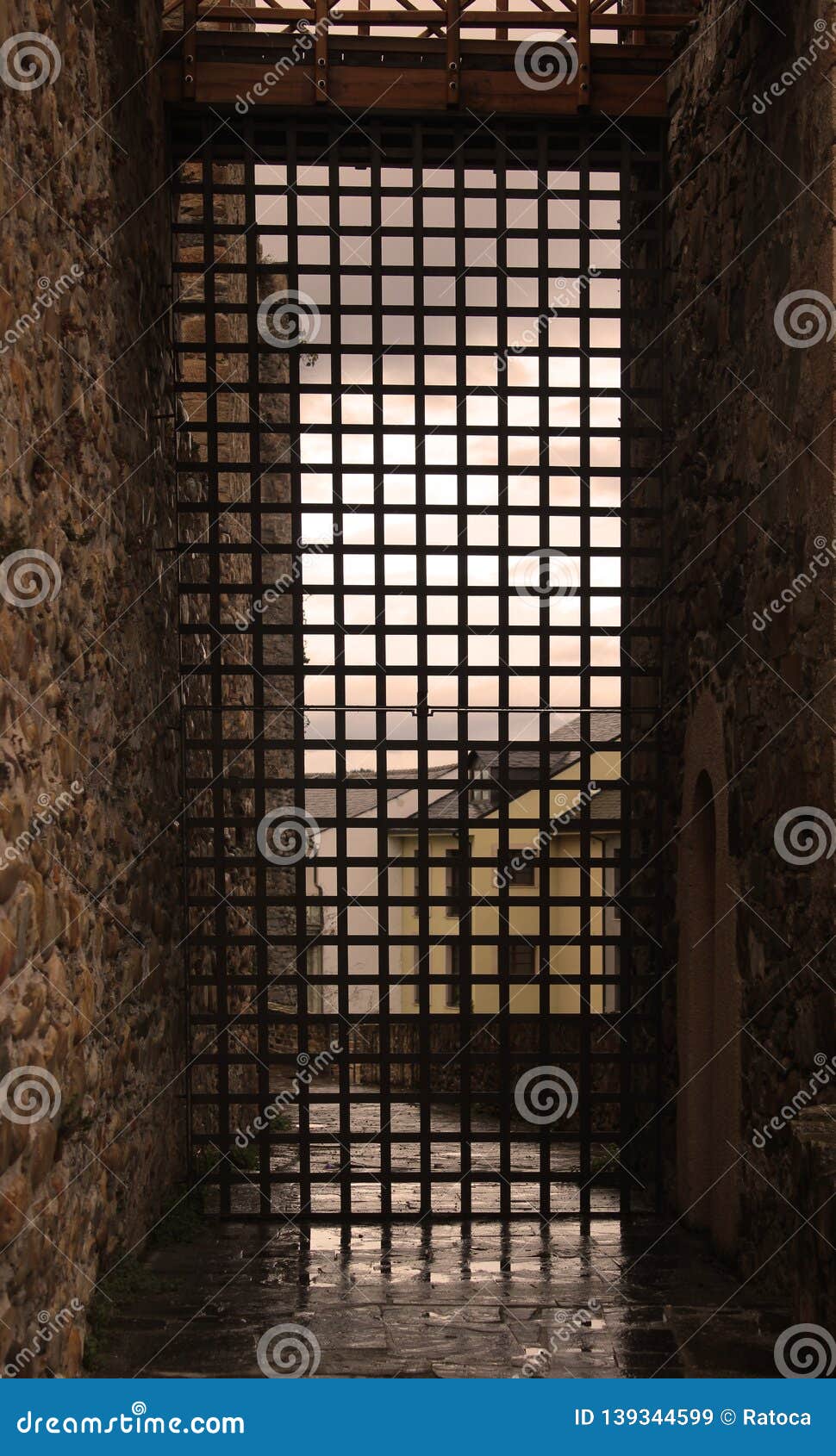 Medieval iron grid window stock image. Image of iron - 139344599