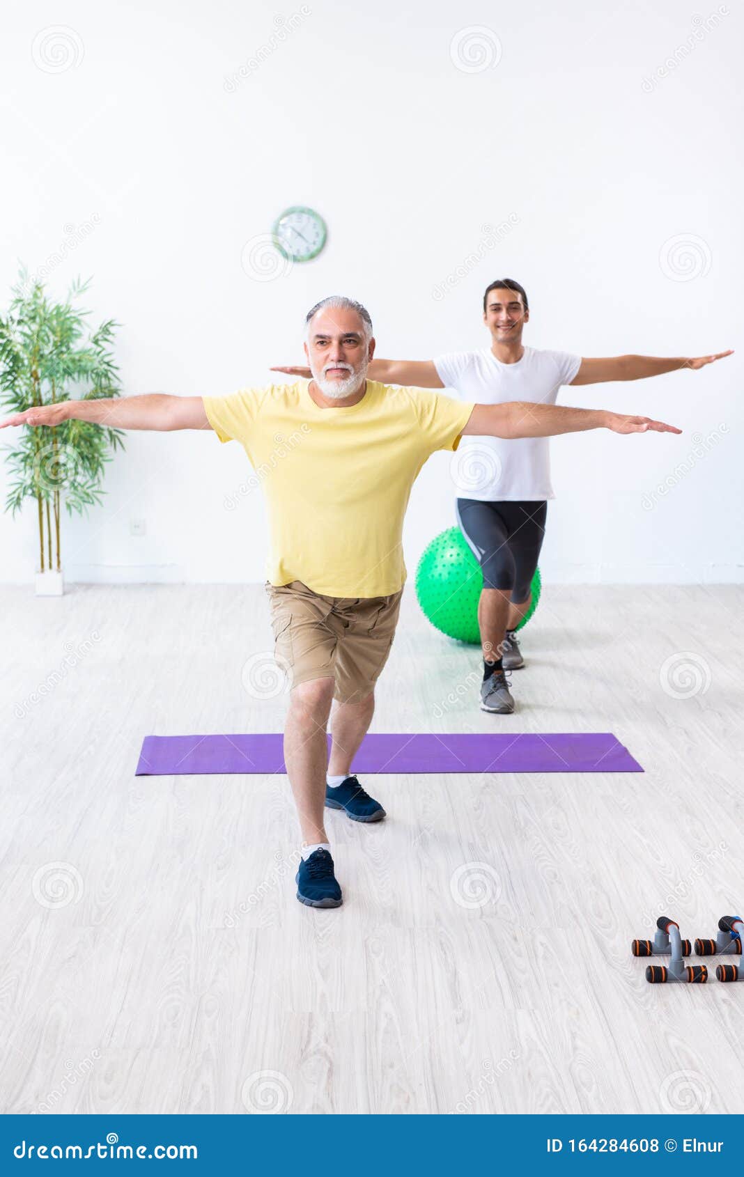 Old Man Doing Exercises Indoors Stock Photo - Image of coaching, coach ...
