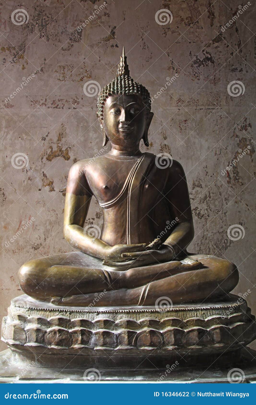 Old Metal Buddha Statue on Old Concrete Wall Stock Photo - Image of ...