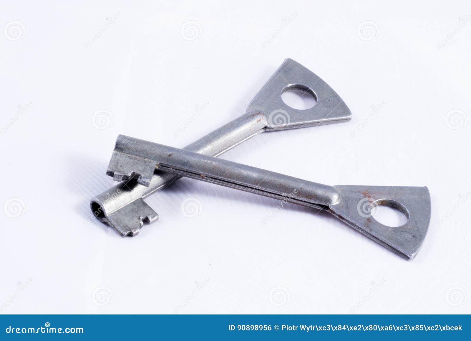 Old Metal Keys on a White Background Stock Photo - Image of building ...