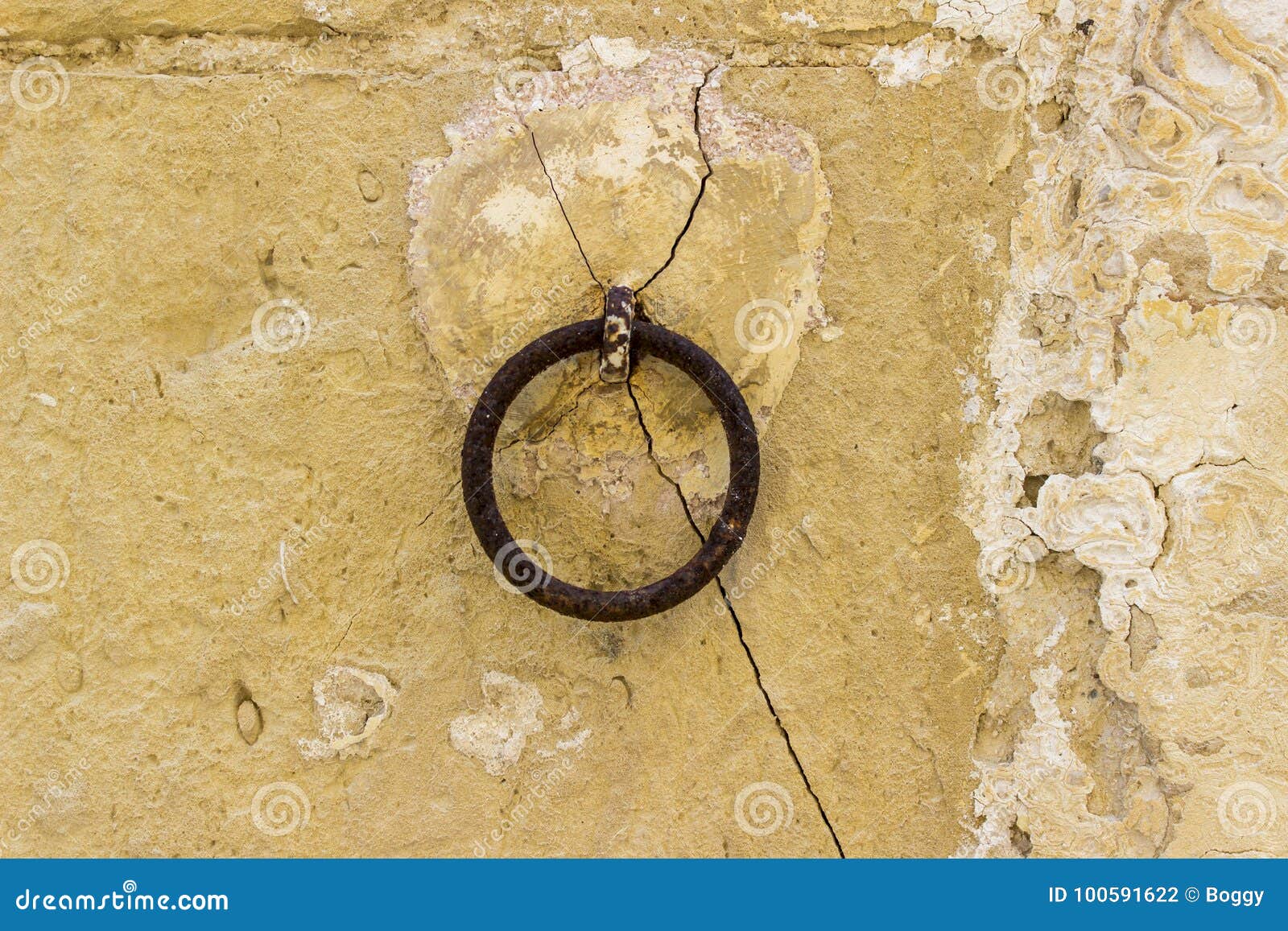 Old metal ring on the wall stock photo. Image of wall - 100591622