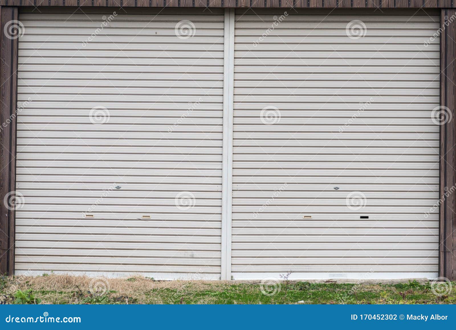 An Old Metal Roller Shutter at a Closed Store Front. Stock Photo ...