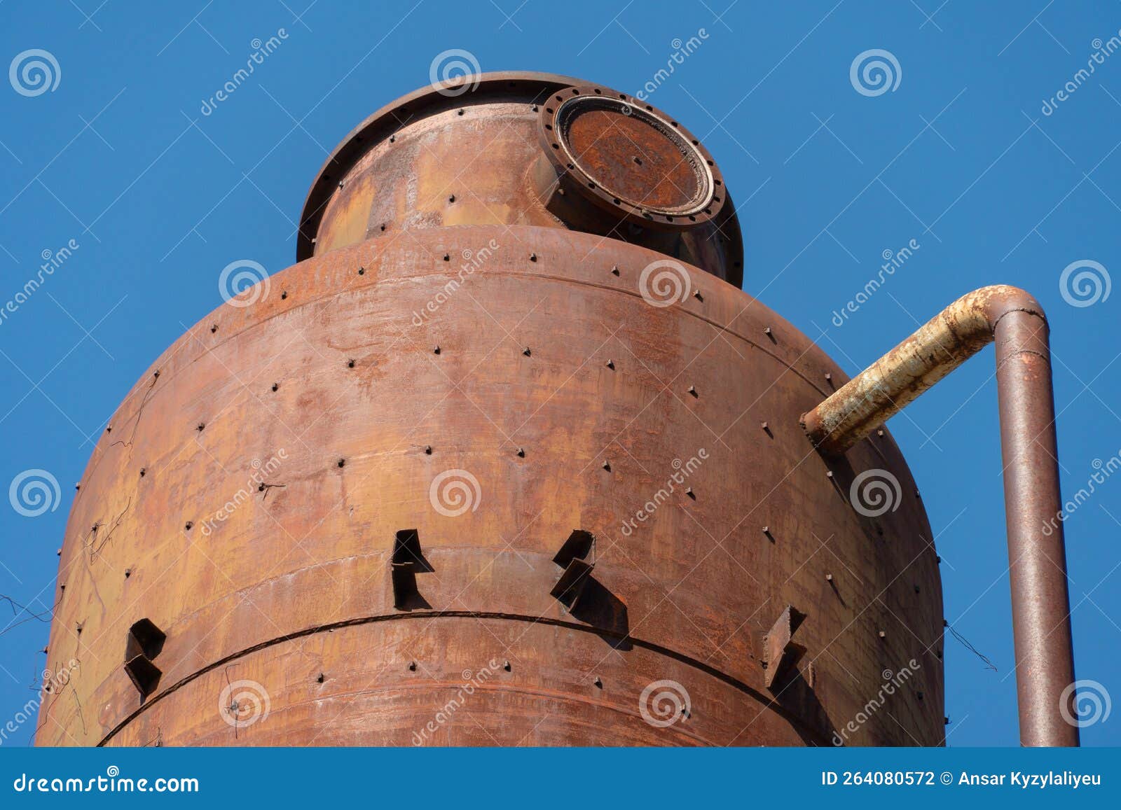 An Old Metal Rusty Water Tower. Old Production Technology, Processing ...