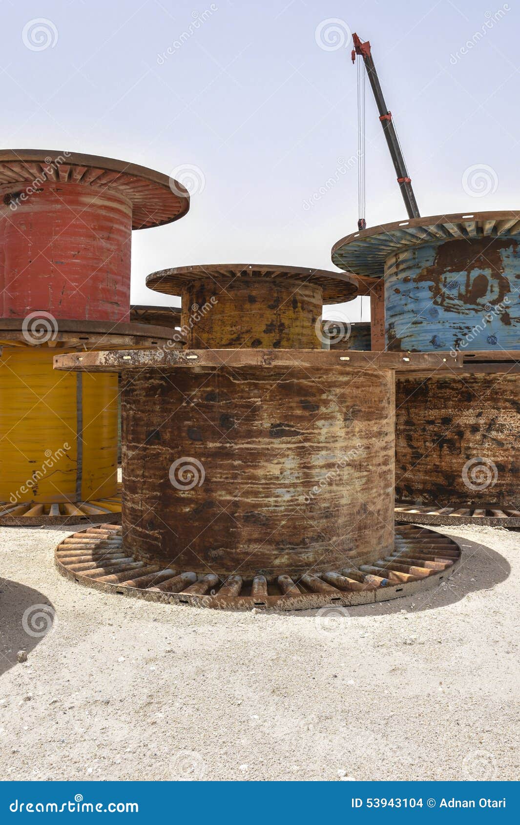 Old Metal Spools Painted Blue and Red Stock Photo - Image of burnished ...