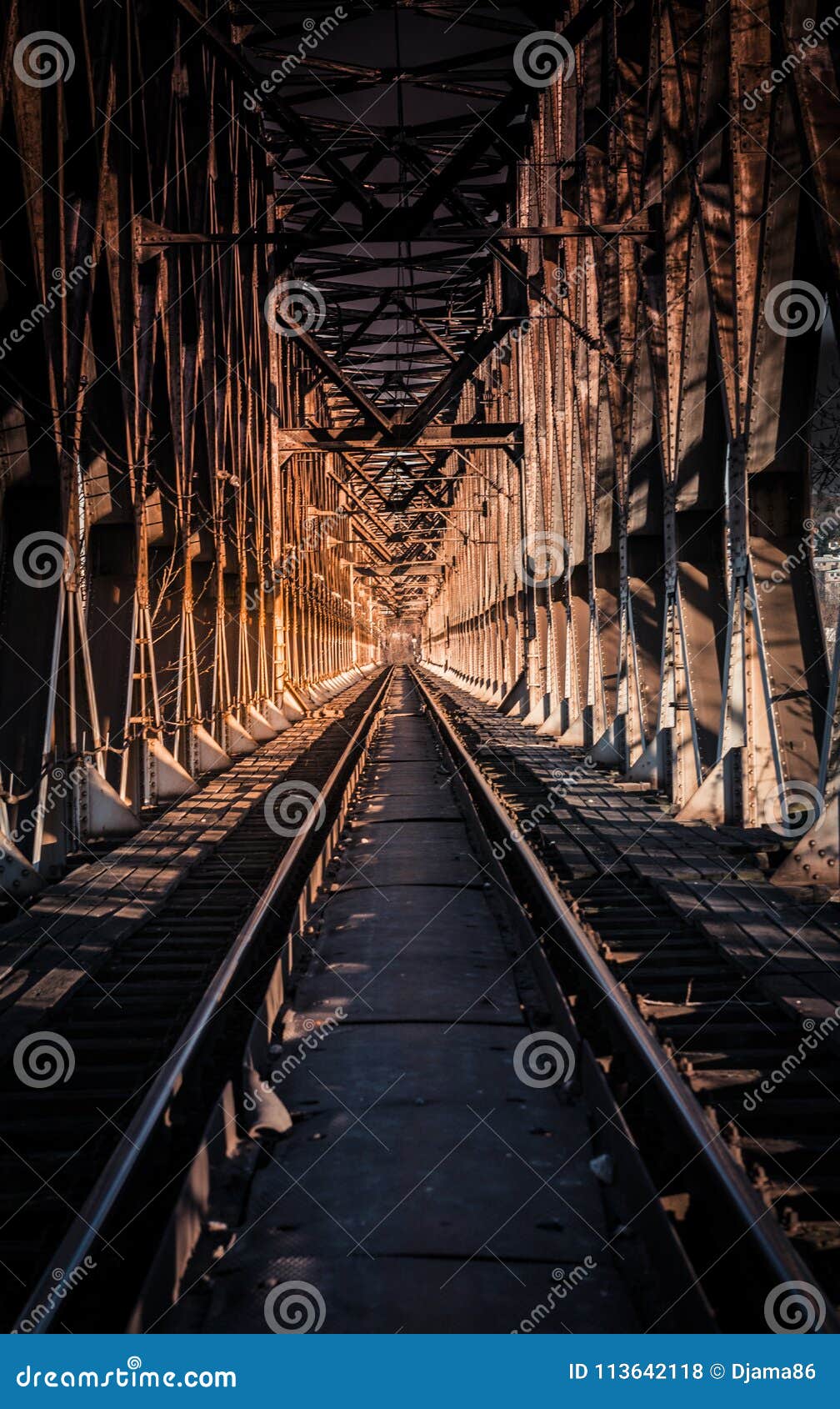 Old metal train bridge stock photo. Image of illuminated - 113642118