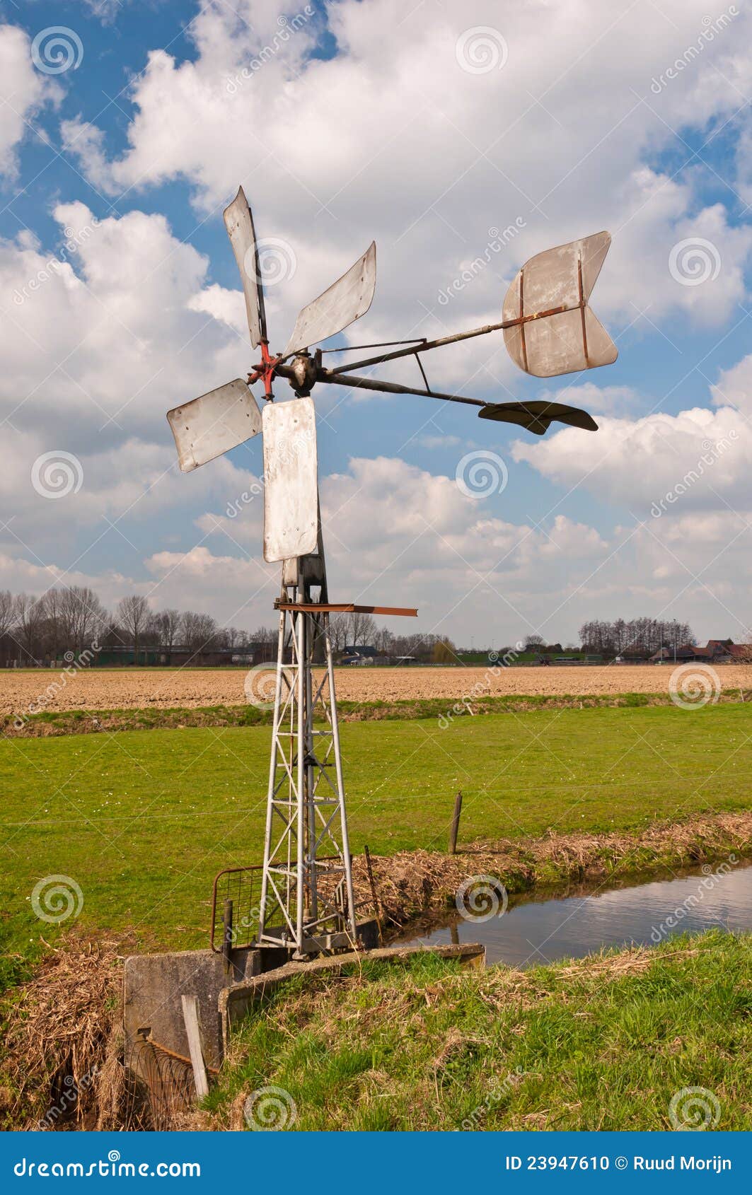 Old Metal Windmill and a Colorful Dutch Landscape Stock Photo - Image ...