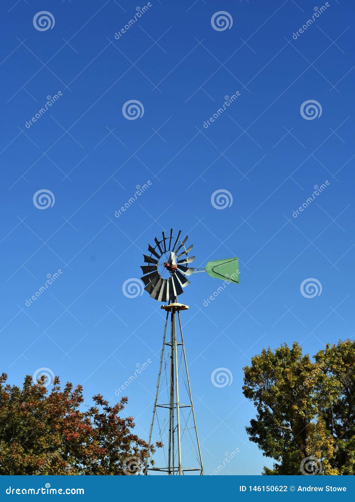 Old metal windmill stock photo. Image of tower, sign - 146150622