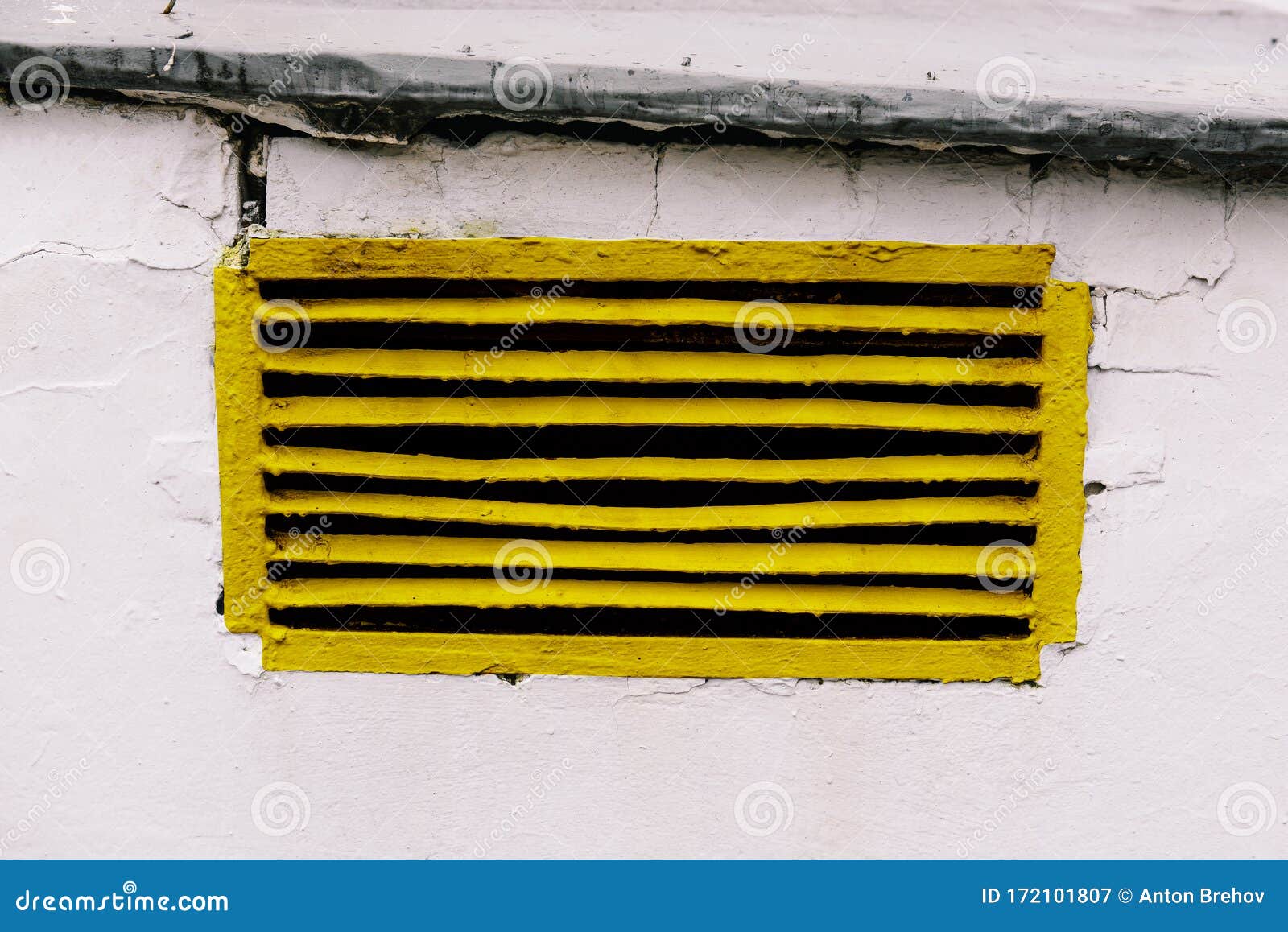 Old Metal Yellow Grill. Ventilation Grill on a White Wall of a Building ...