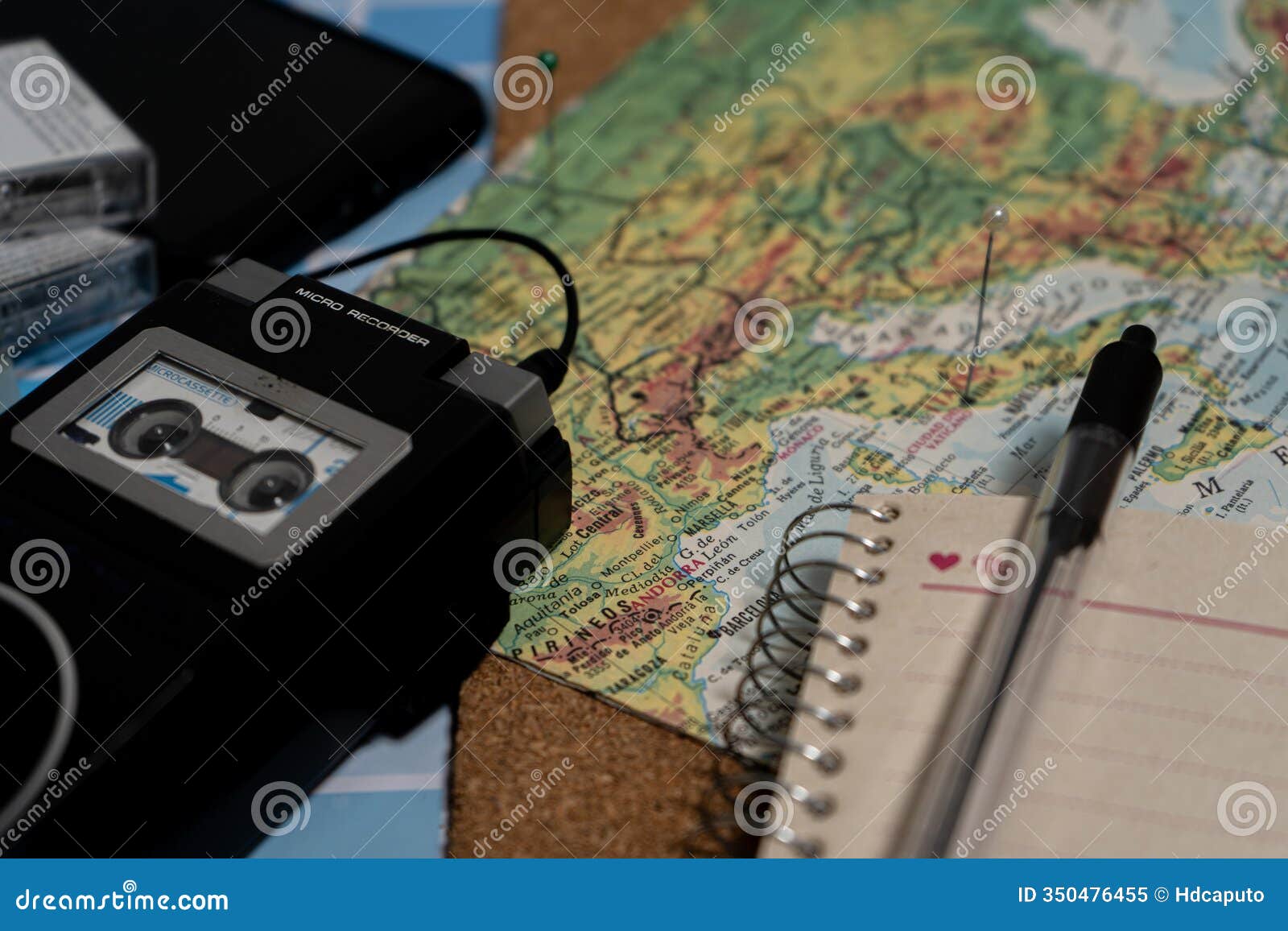 Old Micro Cassette Recorder with Its Mic and Several Cassettes Next To ...