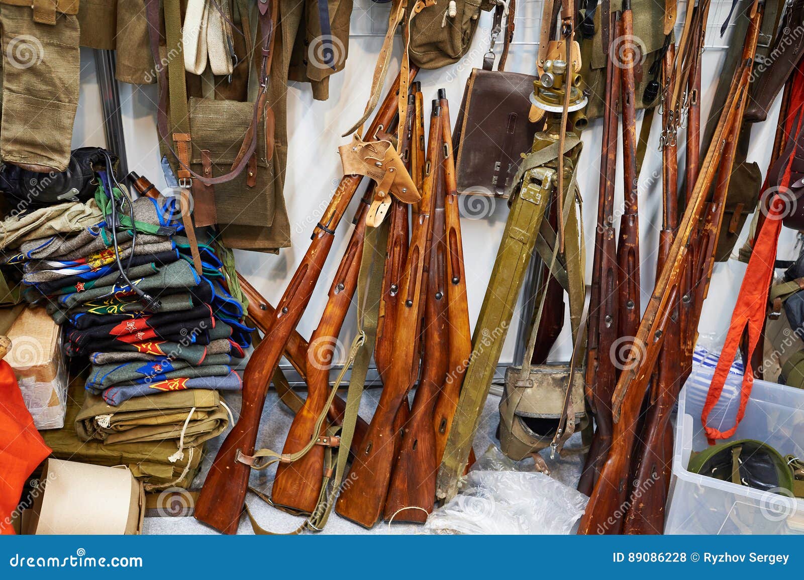 Old Military Uniforms and Weapons in Rarity Store Stock Photo - Image ...