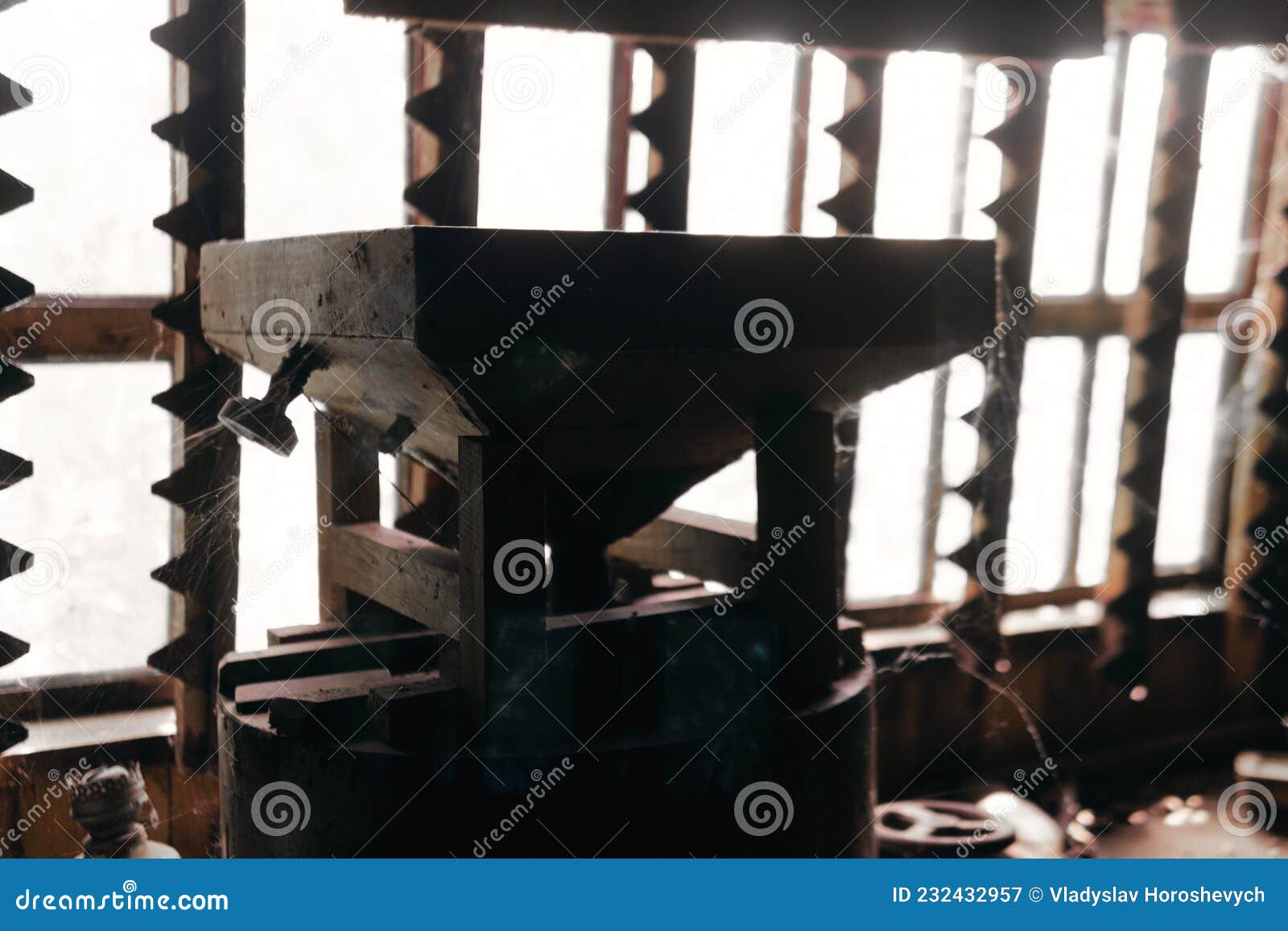 Old Mill For Grain, Against The Background Of The Window. Agricultural ...