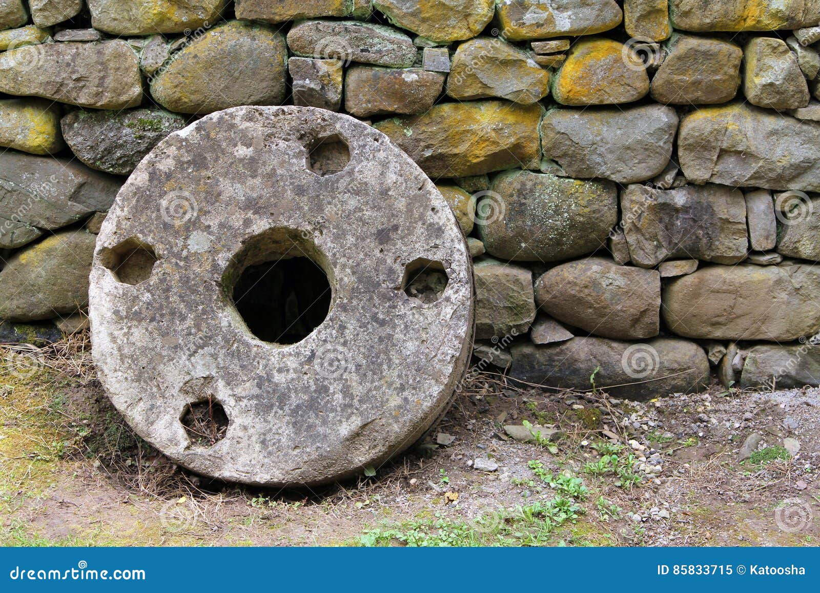Old Millstone on a Background of Stone Wall, Etar, Bulgaria Stock Image ...