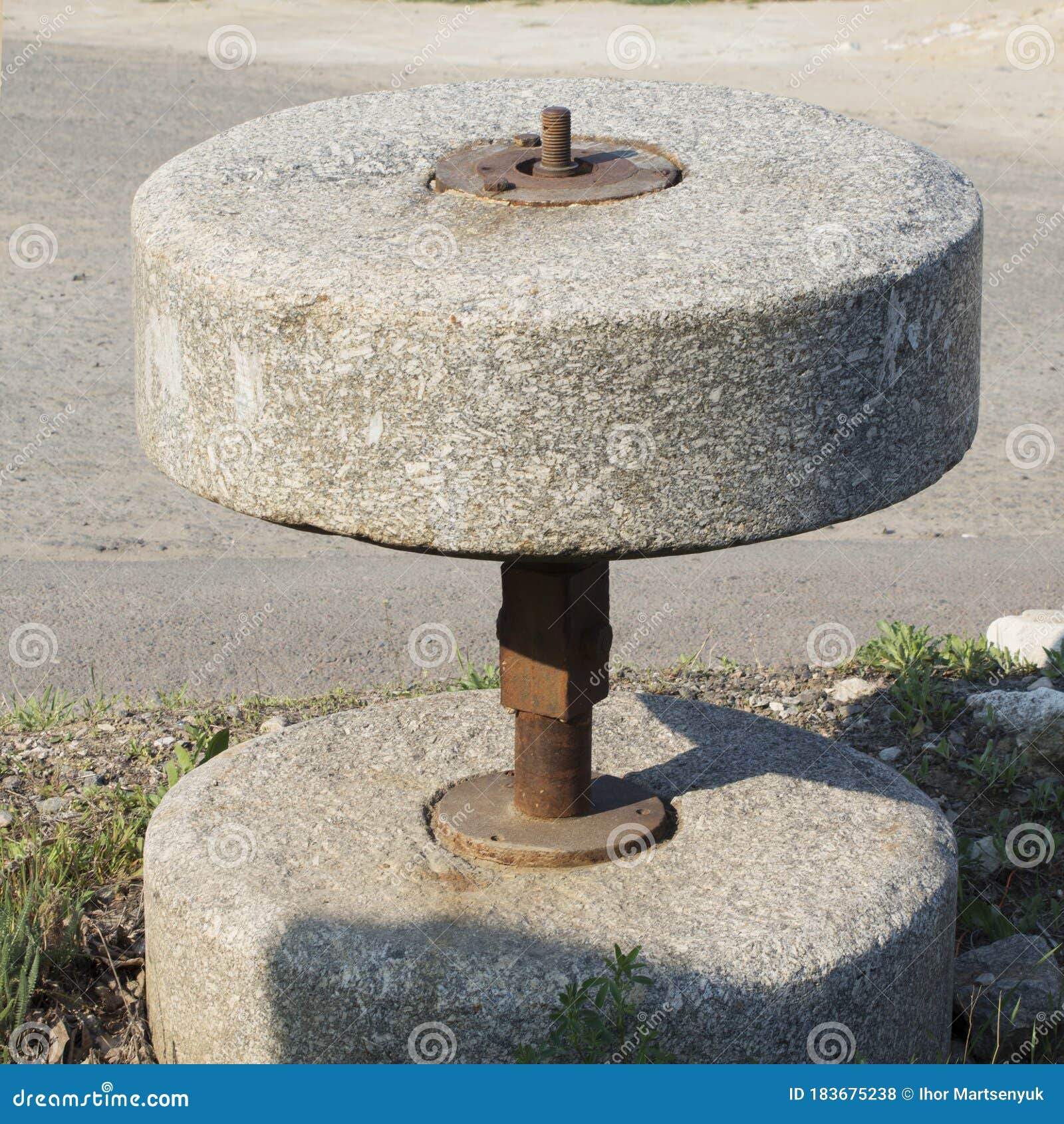 Old millstone for the mill stock photo. Image of grinder - 183675238