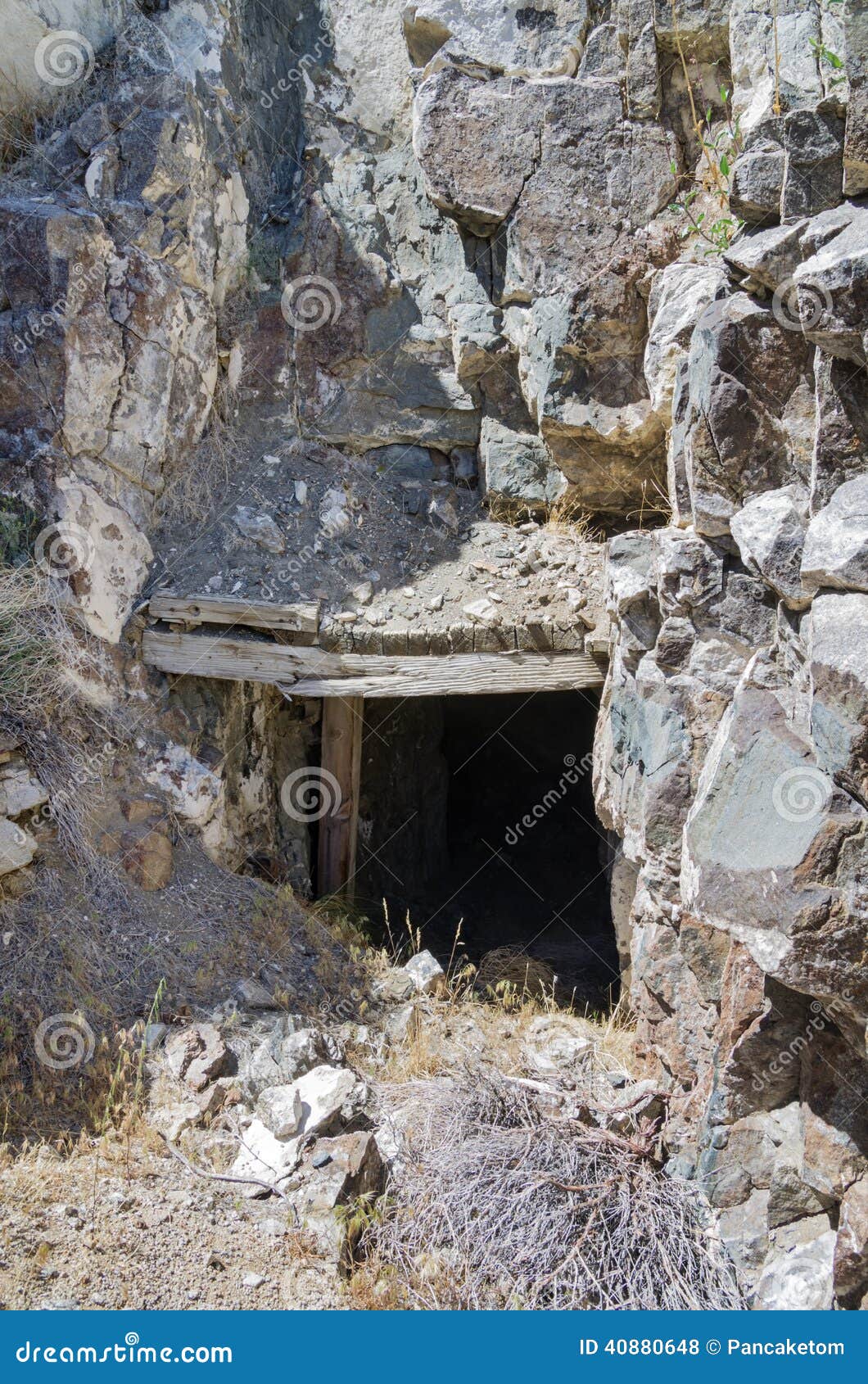 Mine Entrance Barred By Warnbing Sign On A Barbed Wire Fence And A ...