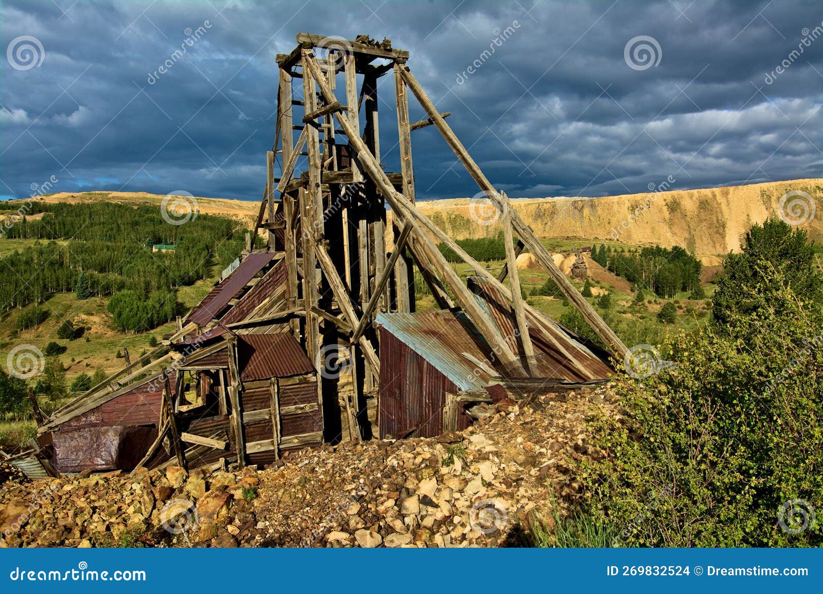 An Old Mine Sitting Alone in the Mountains, with a Sky and Clouds ...
