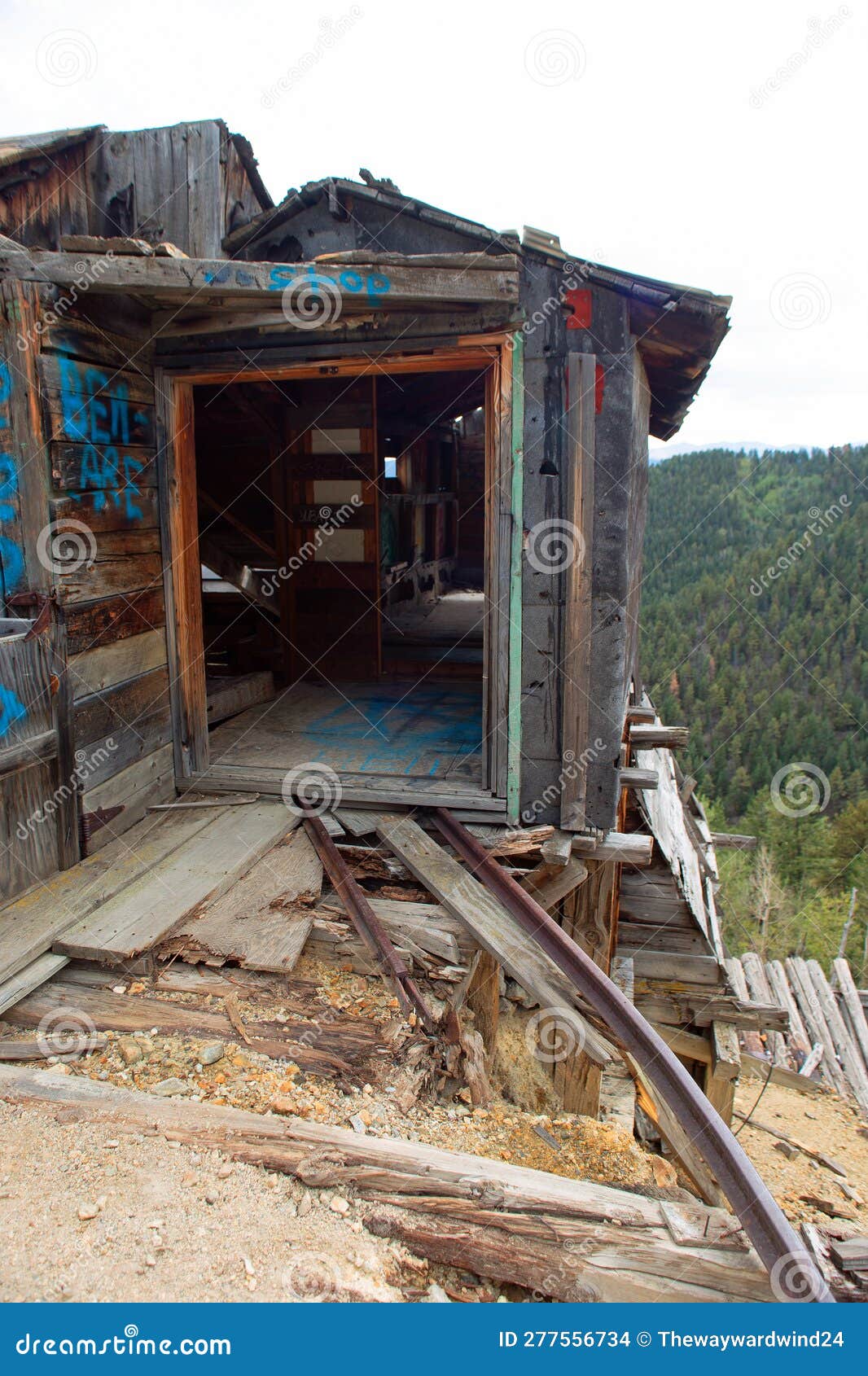 An Old Mining Shack Abandoned and with Graffiti Stock Photo - Image of ...