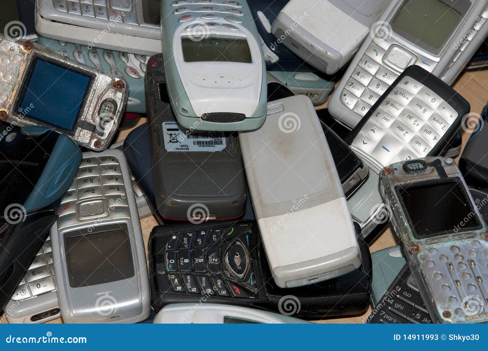 Old Mobile Phones Graveyard Stock Image - Image of corrosion, white ...
