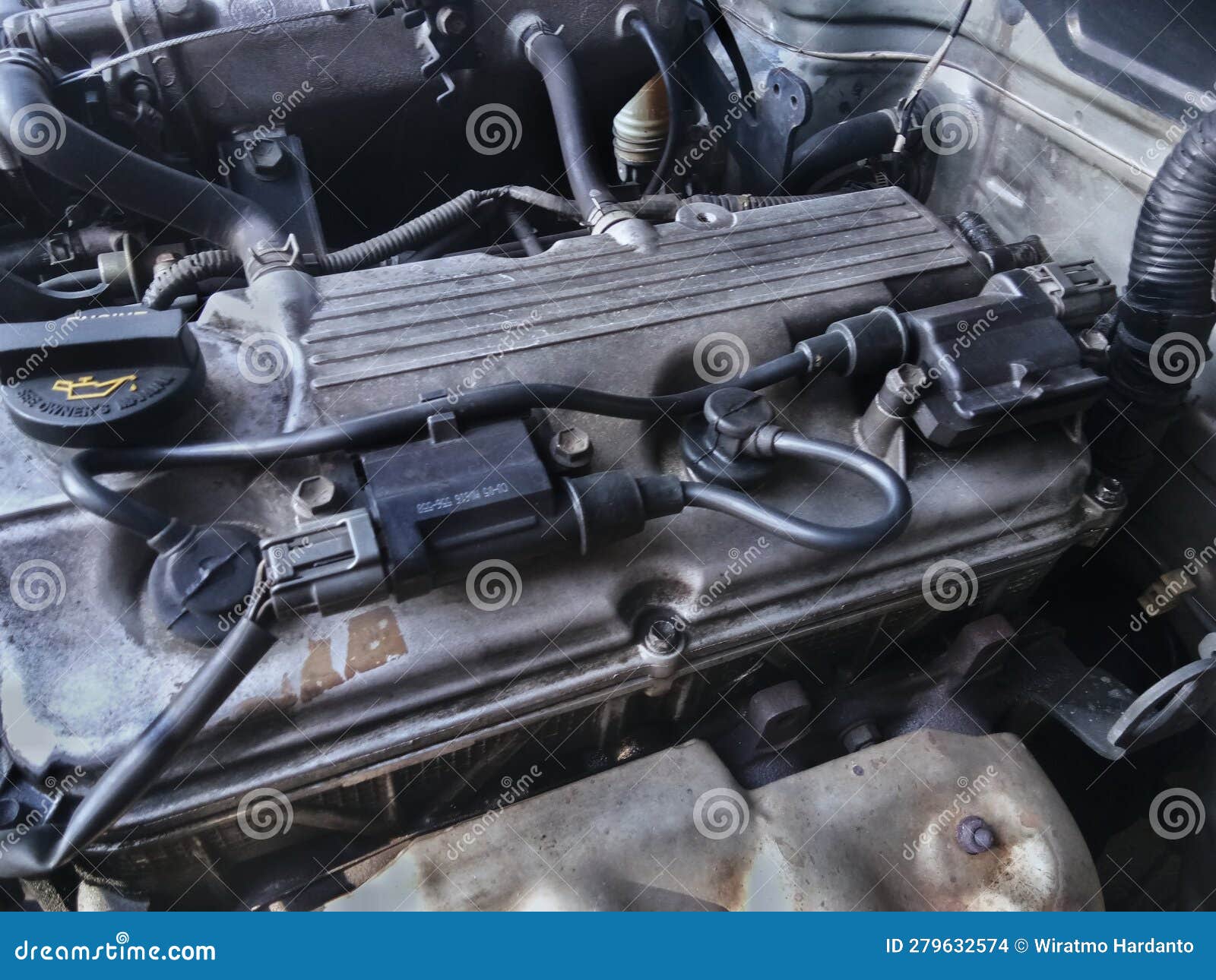 Old Model Car Injection Engine Where One Coil is Used To Burn Two Spark ...