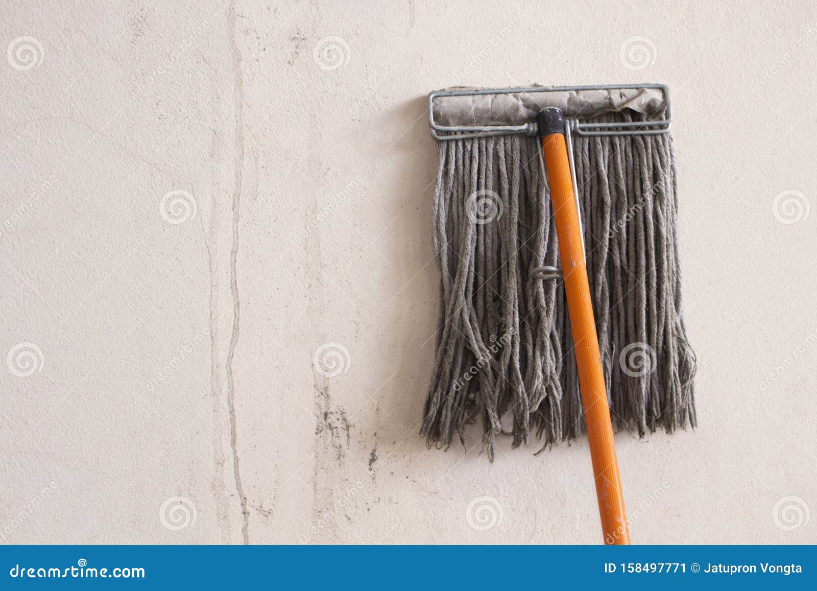 Old Mop with dirty wall stock image. Image of wall, dirty - 158497771
