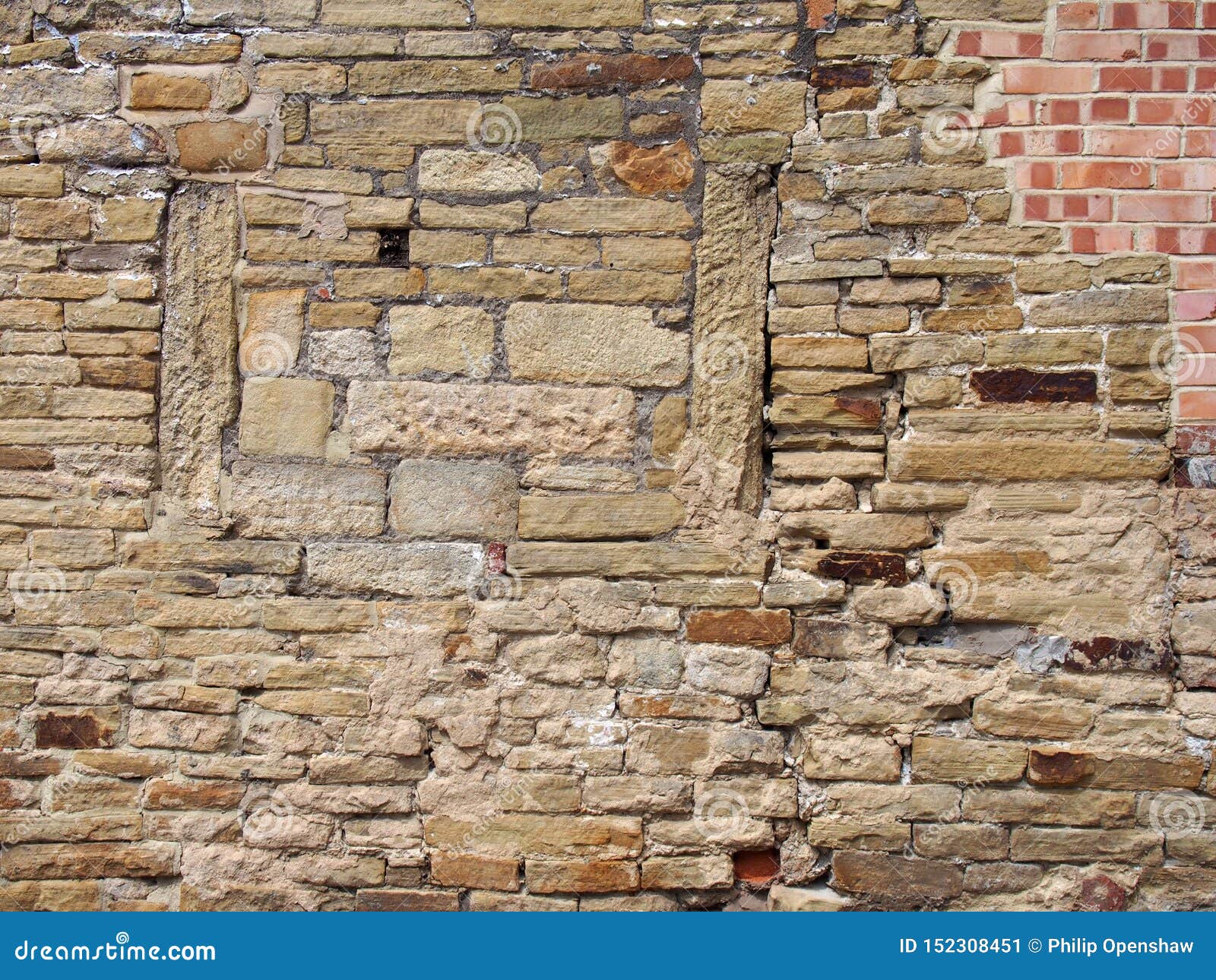 Old Much Repaired and Patched Wall Mad of Mixed Types of Bricks and ...