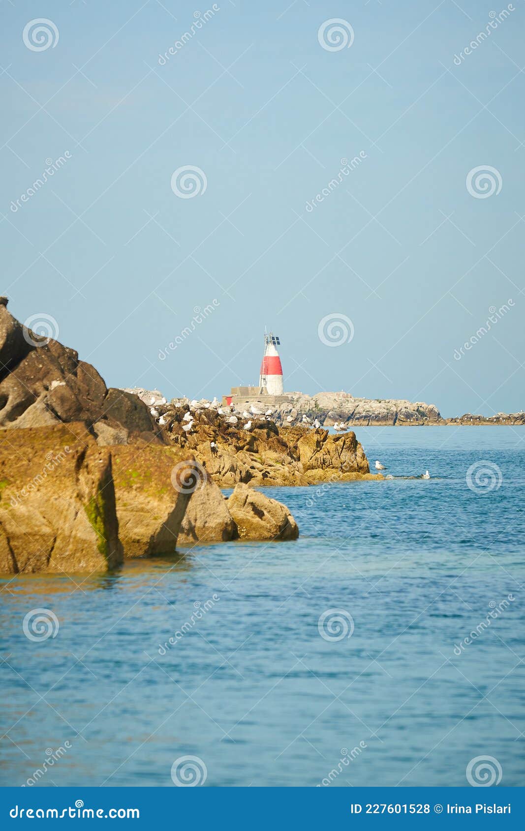 Old Muglins Lighthouse on the Isolated Island the Backdrop of the Blue ...