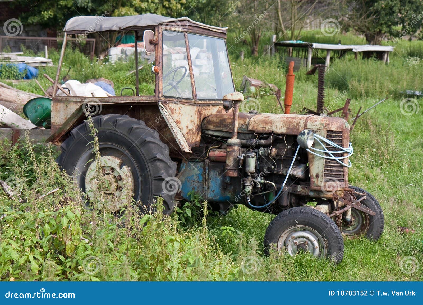 Old neglected tractor stock photo. Image of agricultural - 10703152