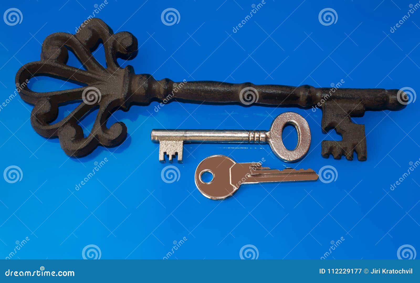Old and New Keys on the Blue Background Stock Image - Image of bronze ...