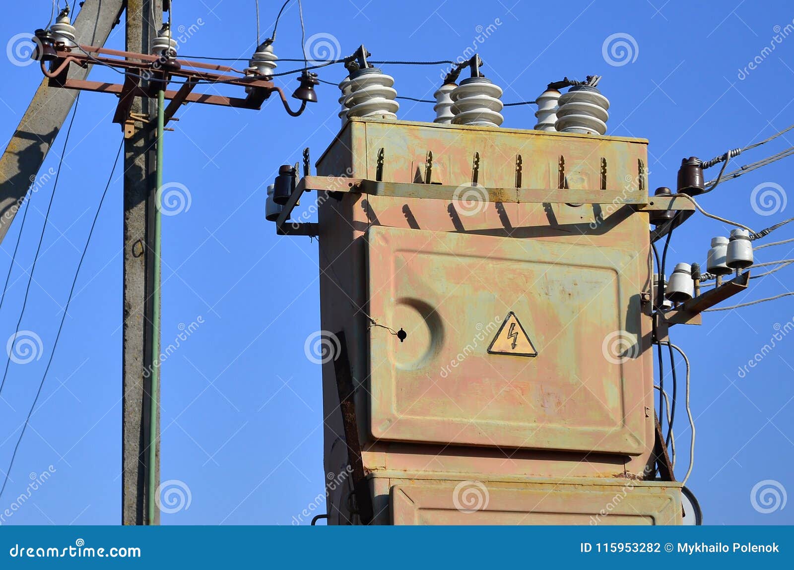 Old and Obsolete Electrical Transformer Against the Background of a ...