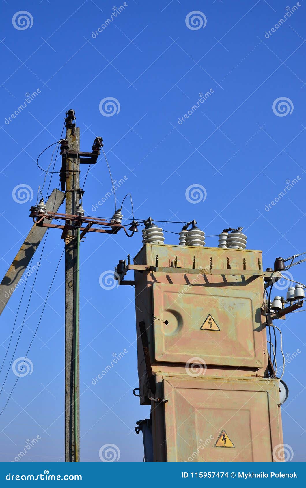 Old and Obsolete Electrical Transformer Against the Background of a ...