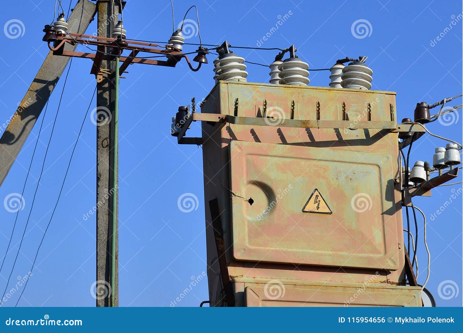 Old and Obsolete Electrical Transformer Against the Background of a ...