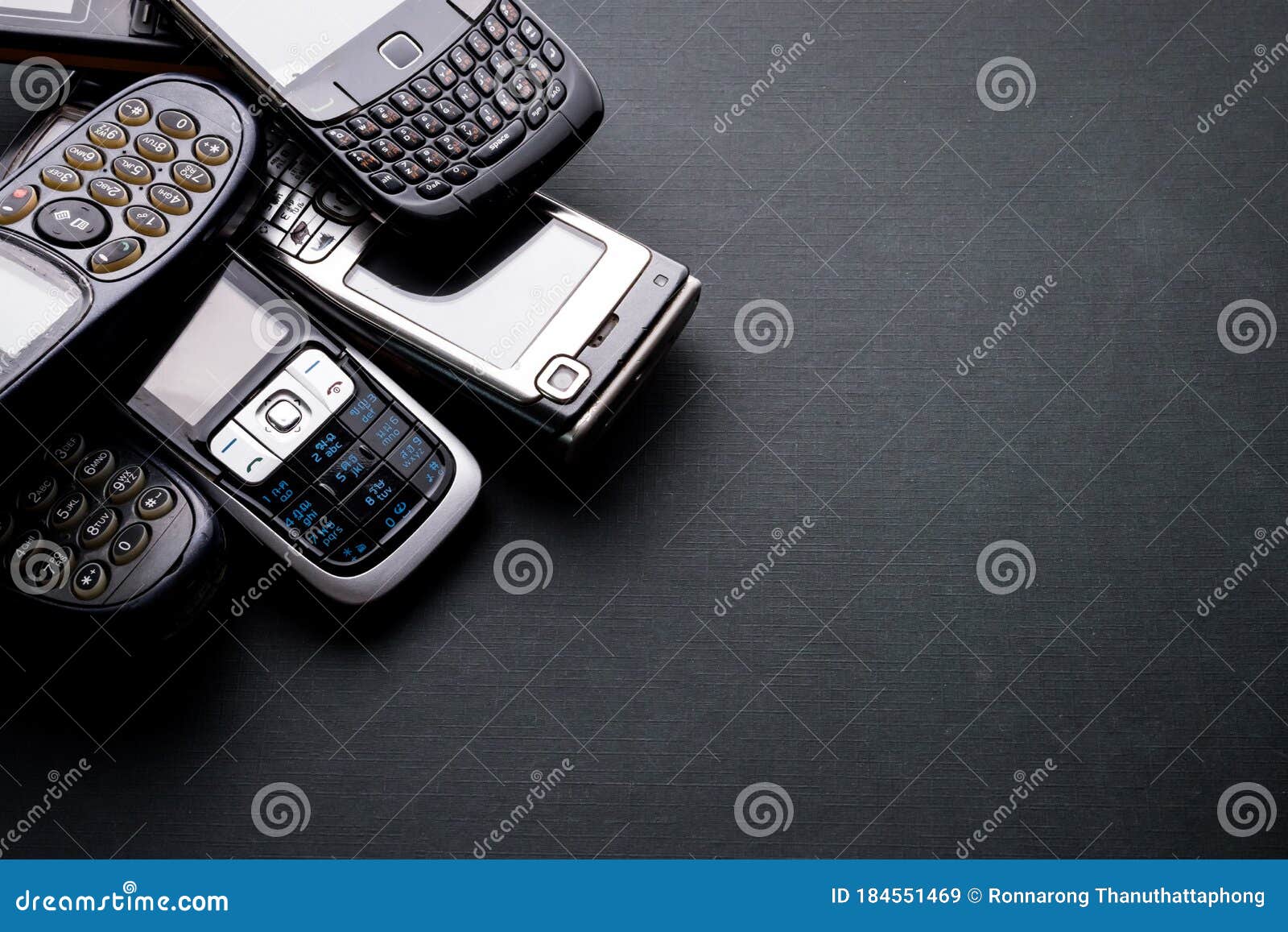Old and Obsoleted Cellphones on a Black Background Stock Image - Image ...